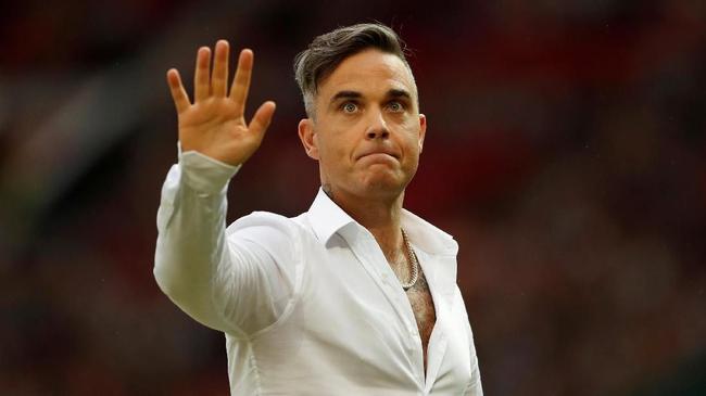 Alasan Manis Robbie Williams Sering Melukis Bareng Anak
