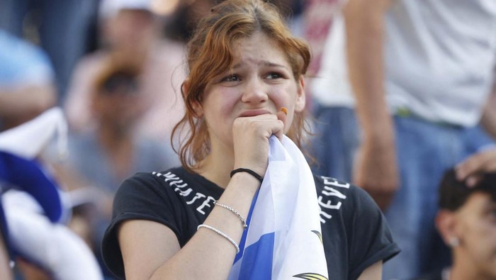 Reaksi Fans Cilik Uruguay Usai Timnya Tumbang Reaksi Fans Cilik Uruguay Usai Timnya Tumbang